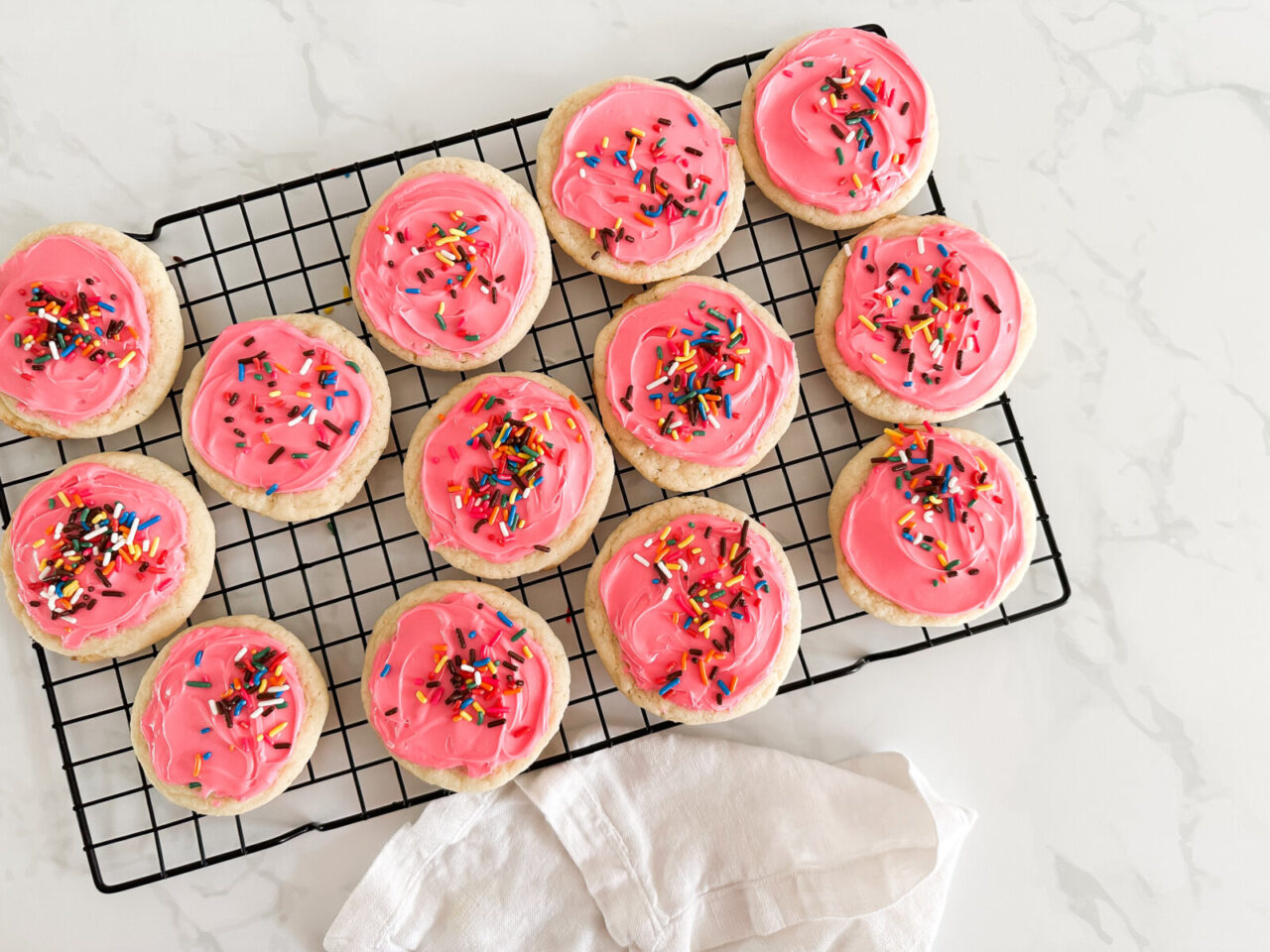 Pink Frosted Sugar Cookies - The Flexible Chef